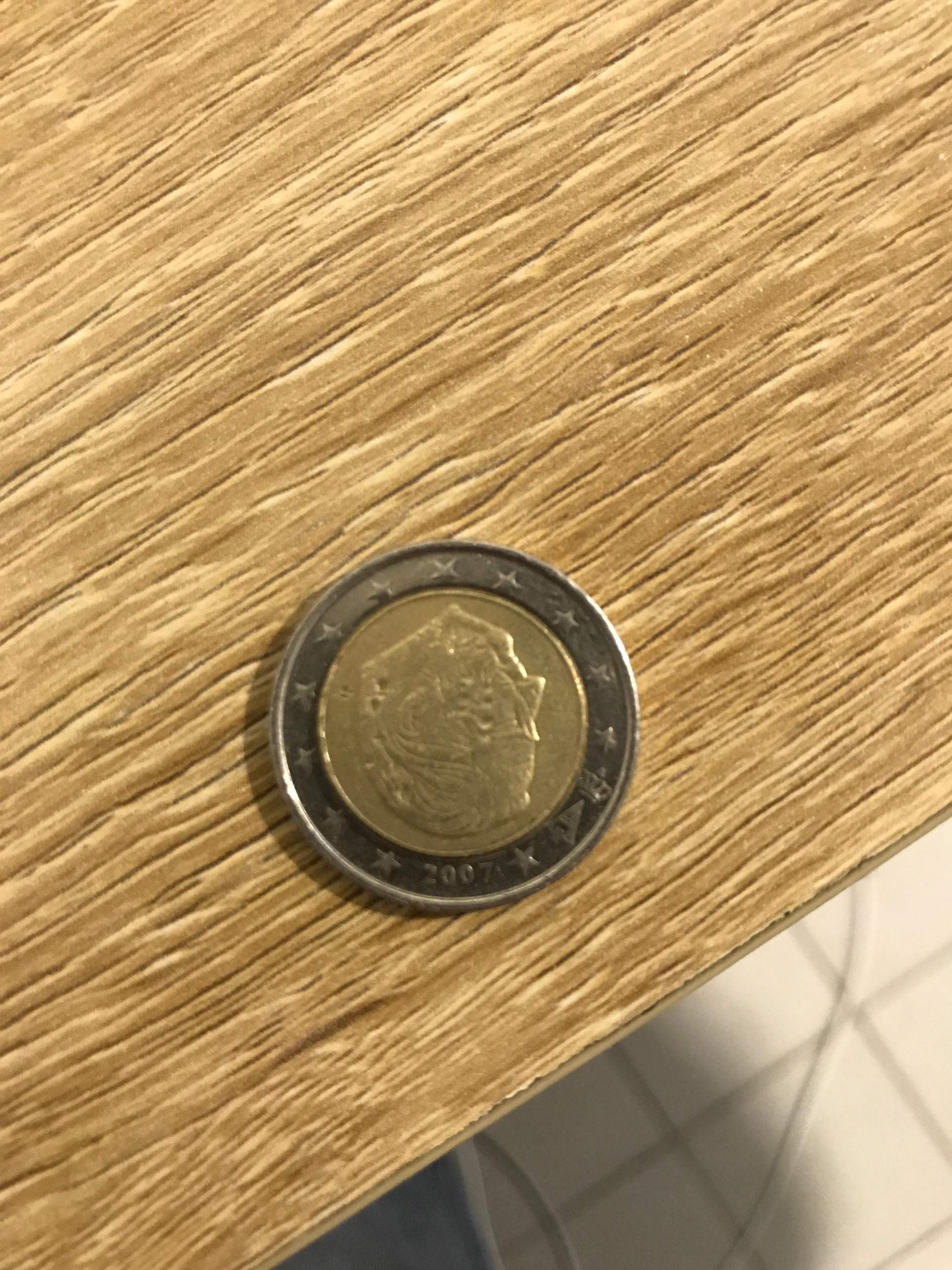 Ist diese Münze kaputt gemacht worden?oder interessant für Münz Sammler ...