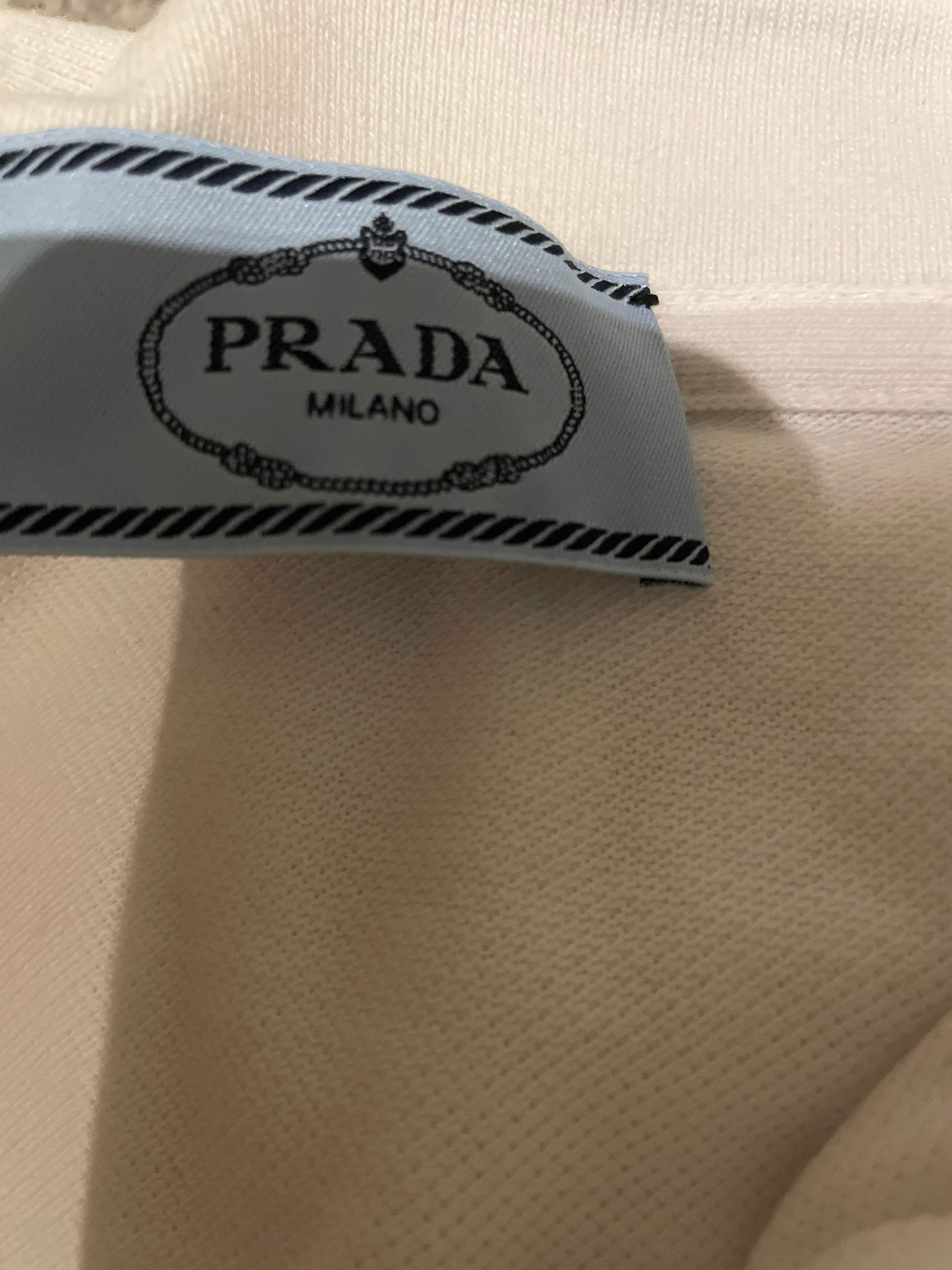Prada Polo shirt original oder Fake? (Kleidung, Mode, Fashion)
